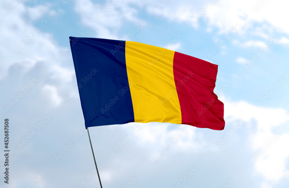 Flag of Chad, realistic 3d rendering in front of blue sky Stock ...