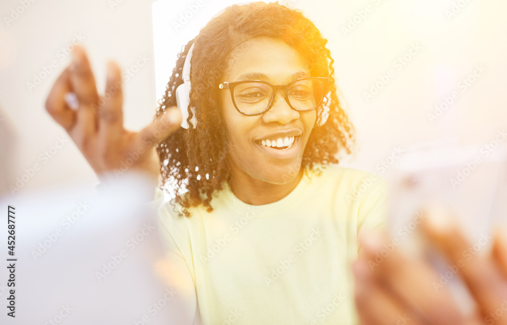 African woman video chat on smartphone Stock Photo | Adobe Stock