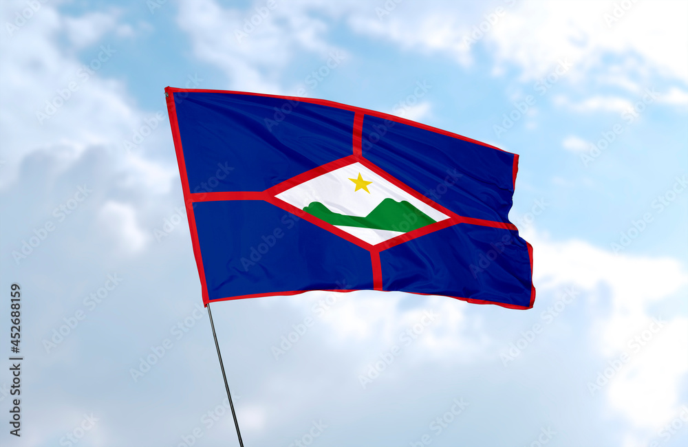Flag of Sint Eustatius, realistic 3d rendering in front of blue sky ...