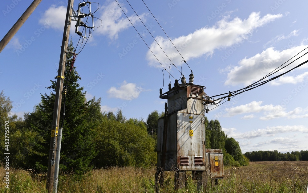 old electrical power transformer and power lines Stock Photo | Adobe Stock