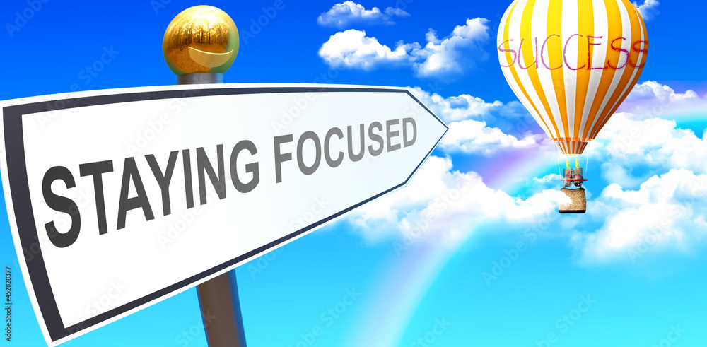 Staying focused leads to success - shown as a sign with a phrase ...