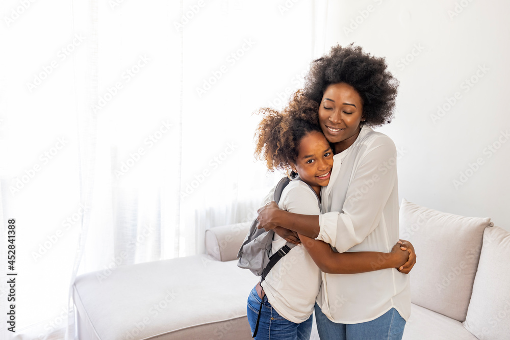 Getting ready for school. Loving mom sends adorable daughter off to ...