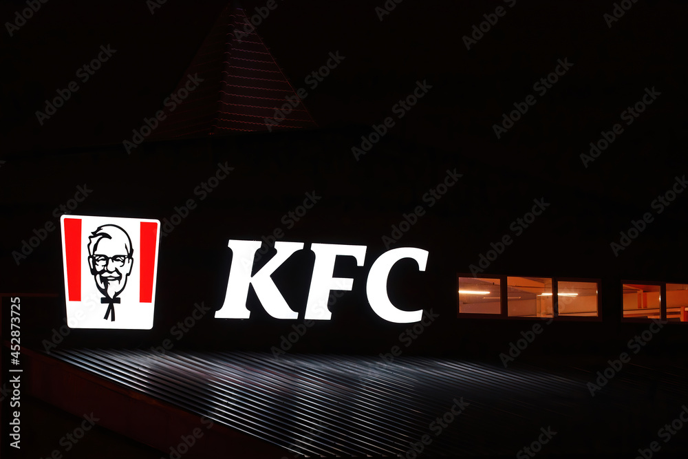 Minsk, Belarus. Aug 2021. KFC restaurant glowing sign at night. KFC ...