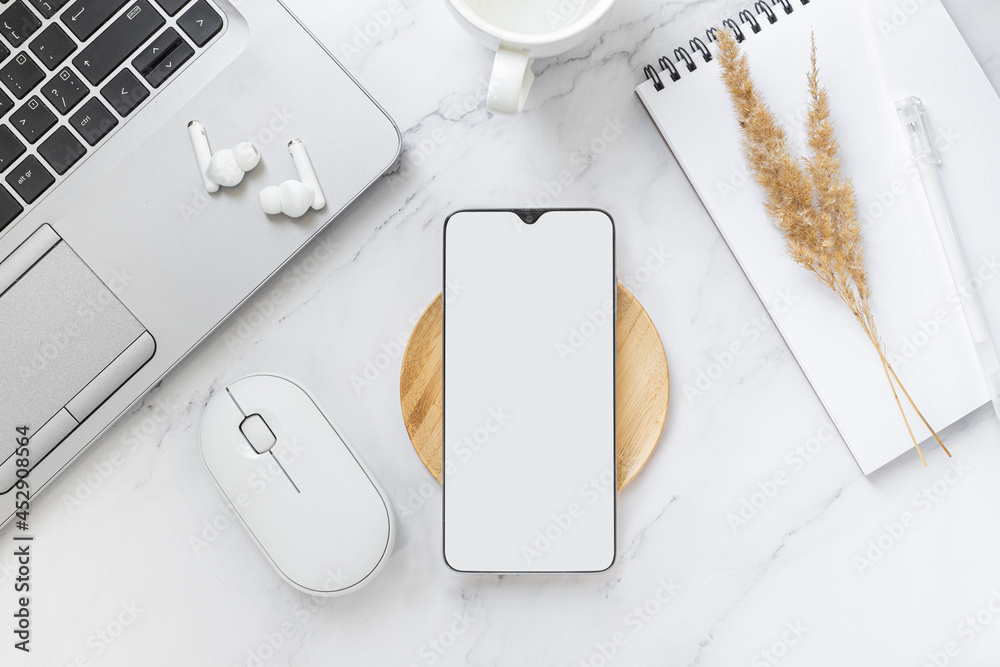 Mock up screen smartphone on marble office table. Minimal business ...