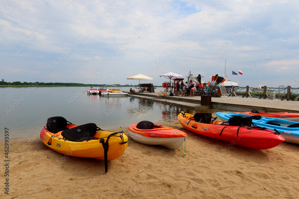 Lake Bukowo. Lake marina. Canoes and pedal boats for rent at the lake ...