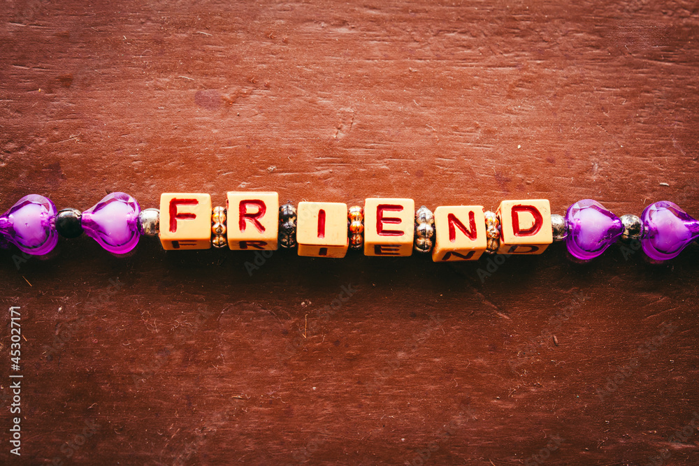 Friendship band with word friend featuring each alphabet with in a cube ...