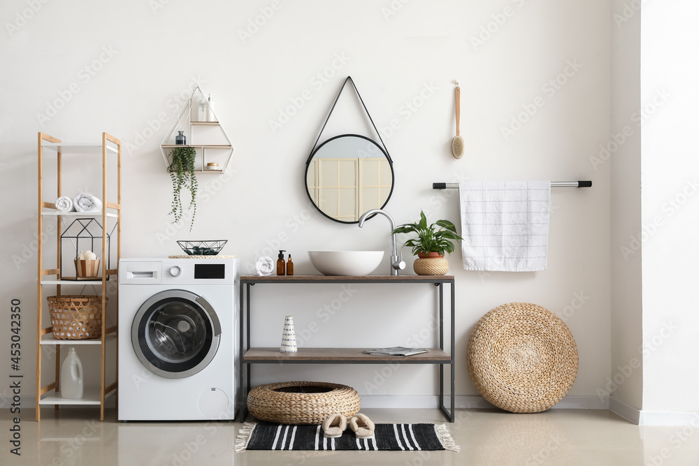 Interior of bathroom with modern washing machine Stock Photo | Adobe Stock