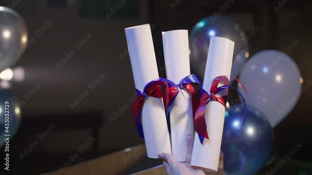 graduation ceremony, university diploma certificates rewound with ...