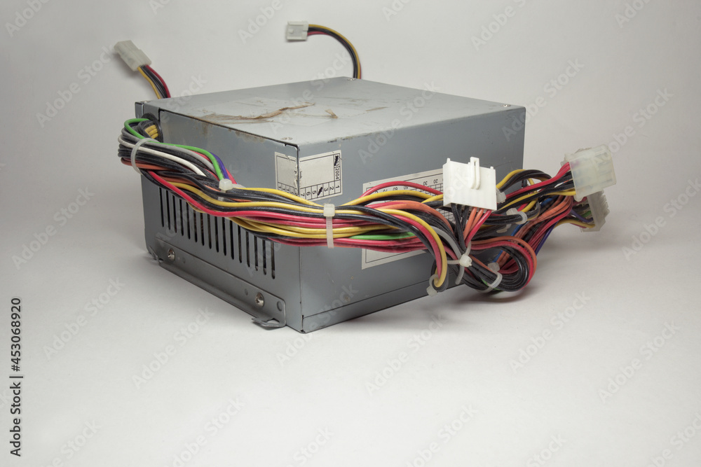 computer ATX power supply unit front side with ventilation openings ...