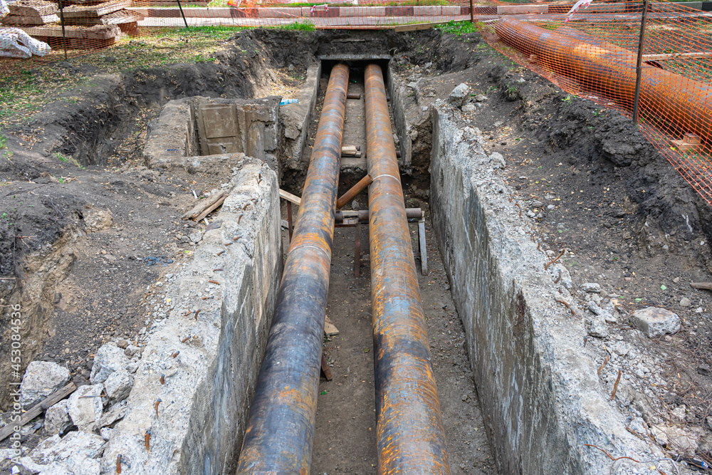 Repair work to replace the old water supply with a new one Stock Photo ...