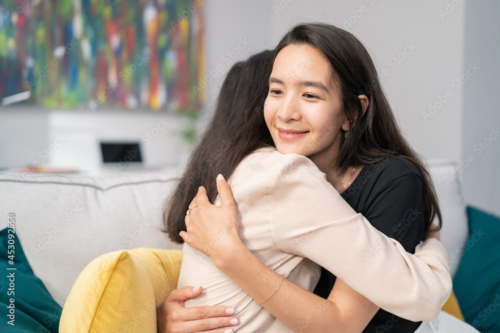 Beautiful Korean, Asian friends meet after a long time in the living ...