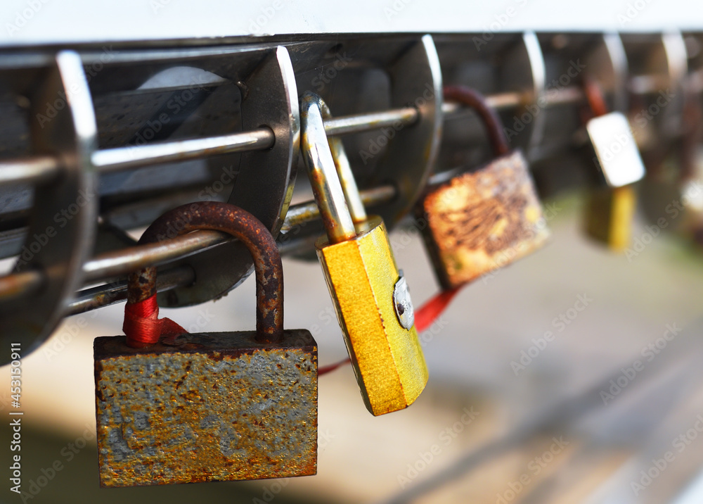 Padlock on Lovers Lock Bridge. Husband and wife during the wedding hung ...