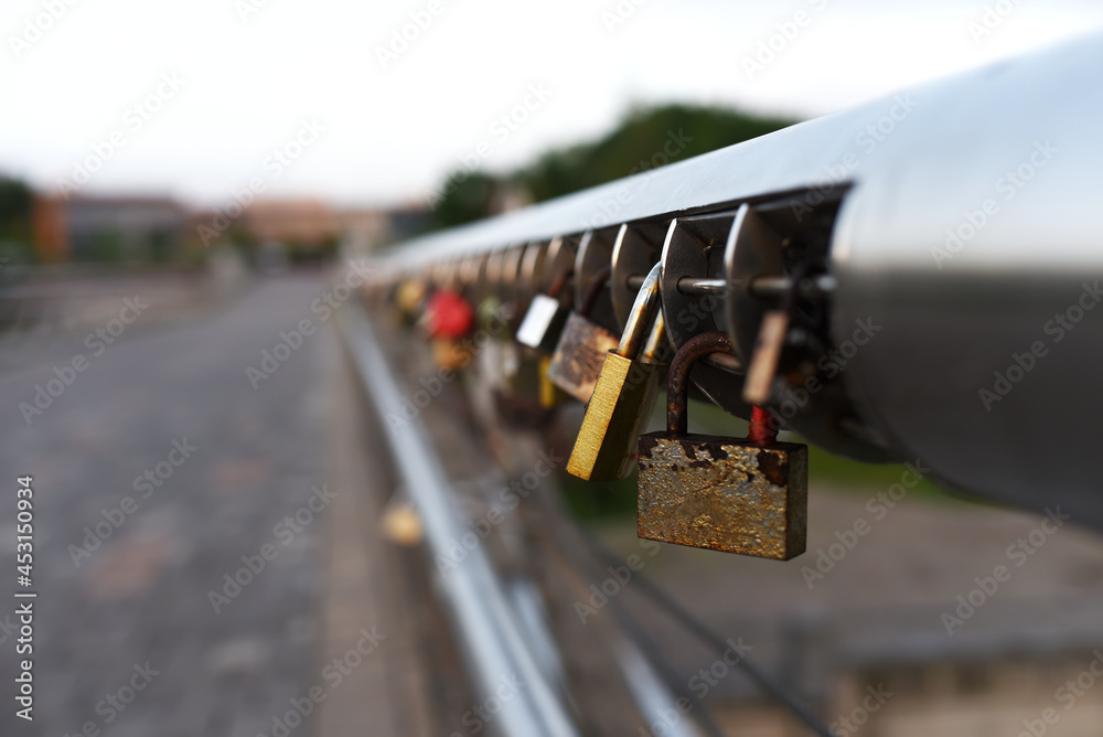 Padlock on Lovers Lock Bridge. Husband and wife during the wedding hung ...