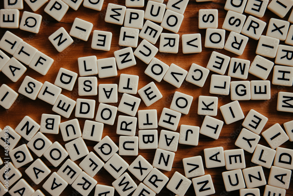Jumbled up scrabble letters, Learning, Inspired foto de Stock | Adobe Stock