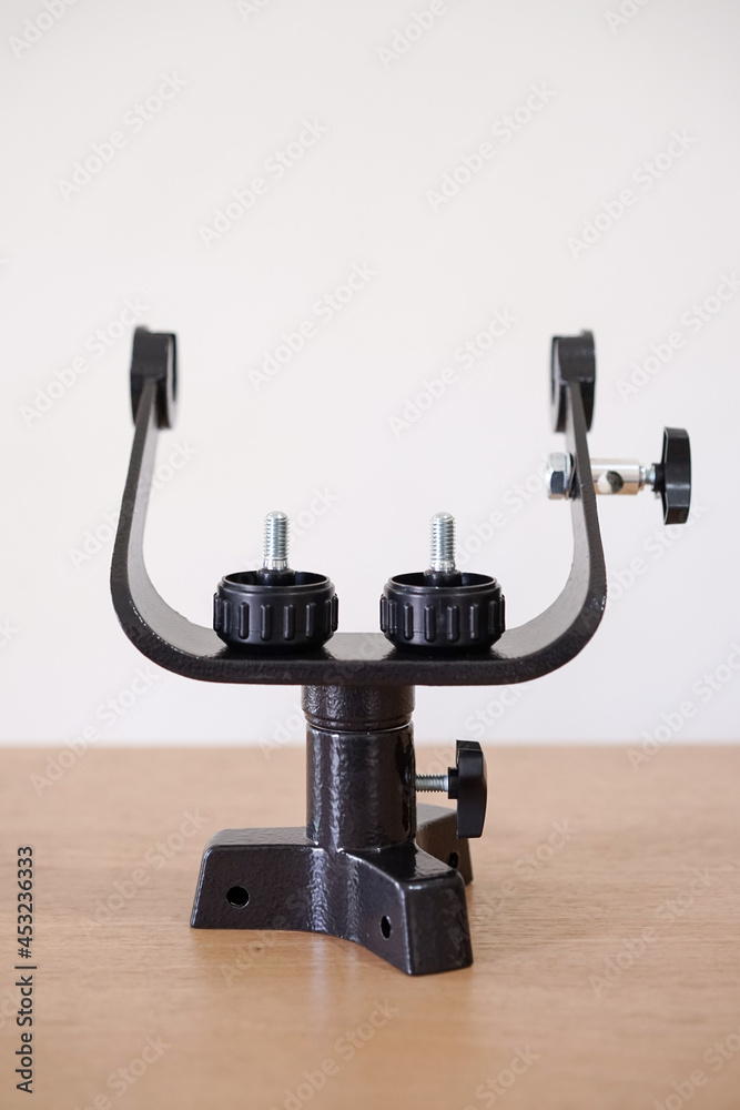 Yoke altazimuth mount, thumb screw, and vertical fine adjustment rod ...