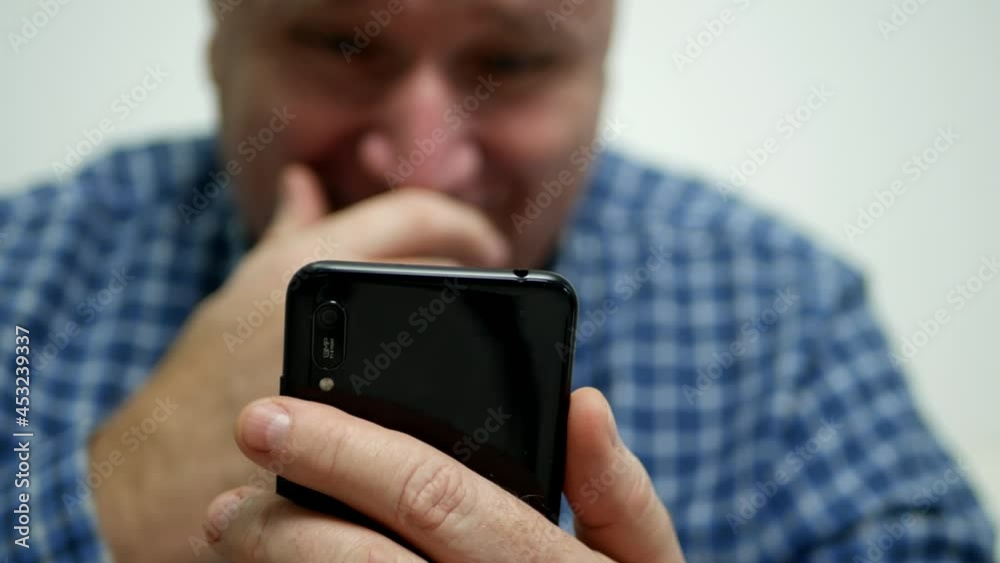 Relaxed Person Smiling Happy, Sending and Reading Messages Using a ...