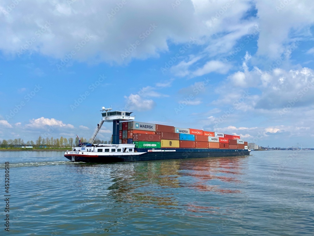 Inland barge freight shipping transport sailing pass Dordrecht in ...