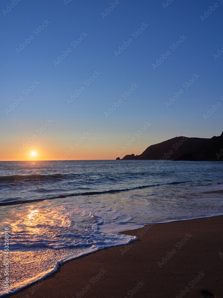 Finisterre Sunset in Galicia, Spain. Mar de Fora beach and Nave cape in ...