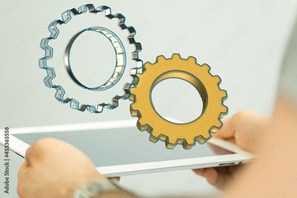 Cogs and gear wheel mechanisms. Hi-tech digital technology and ...
