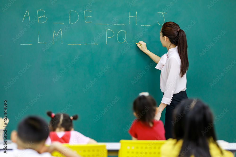 Portrait shot of Asian young beautiful female English language ...