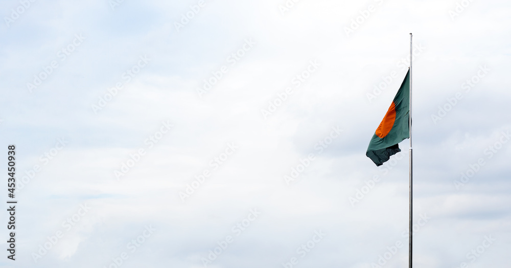 Flying bangladesh national flag under the clean sky with copy spac ...