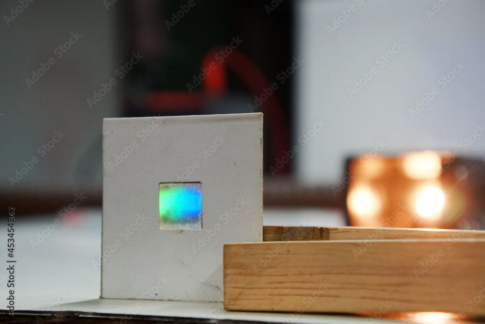 A diffraction grating sheet for studying the interference of visible ...