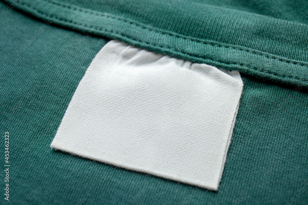 Cotton laundry care clothing label on fabric texture with place for ...