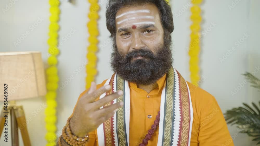 Beard Indian god man or holy guru with rudraksha mala preaching holy ...