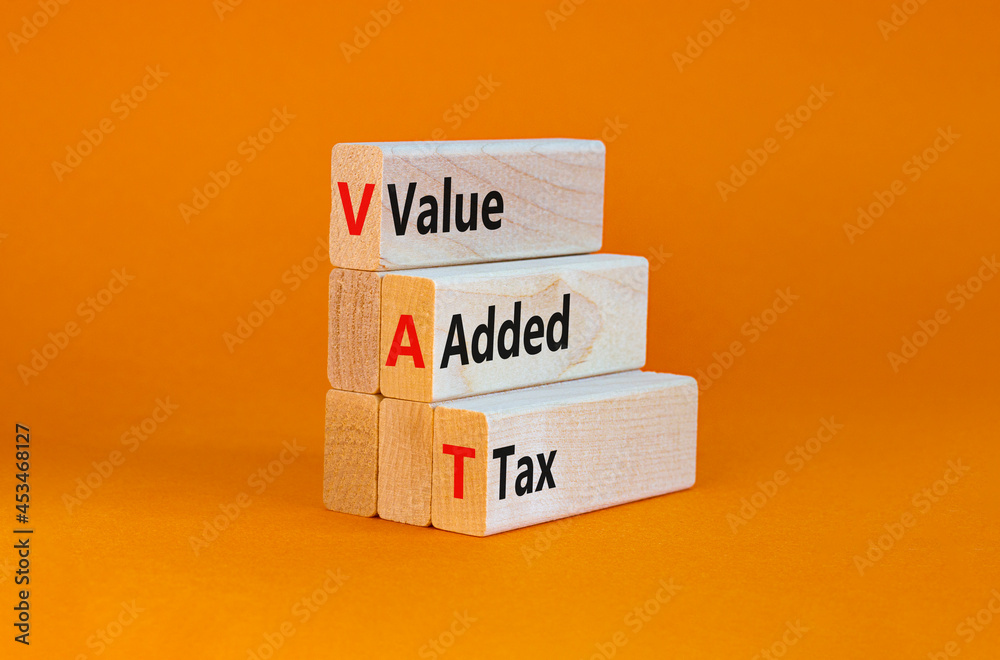 VAT, value added tax symbol. Wooden blocks with concept words 'VAT ...