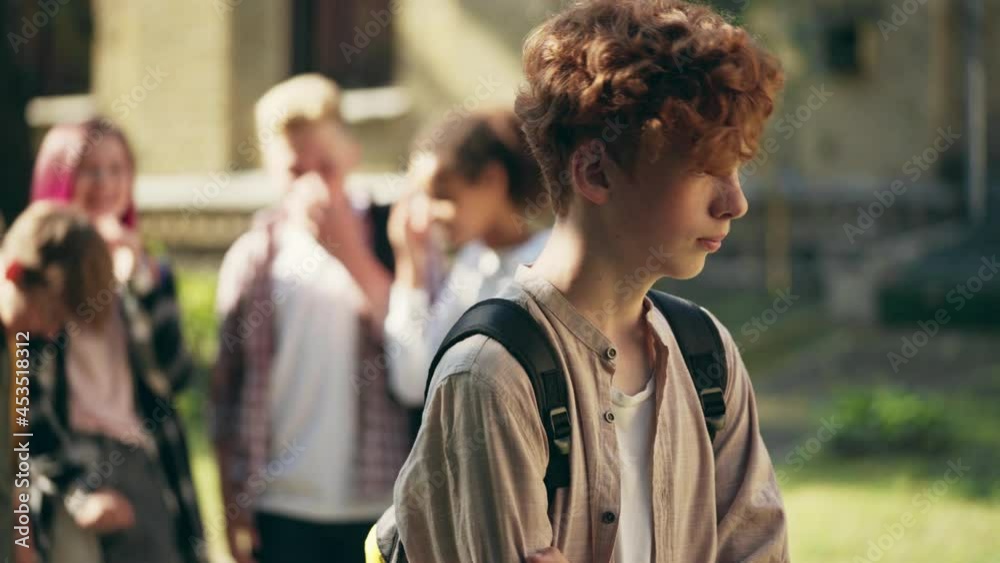 Group of kids laughing at unpopular classmate, teen boy suffering ...