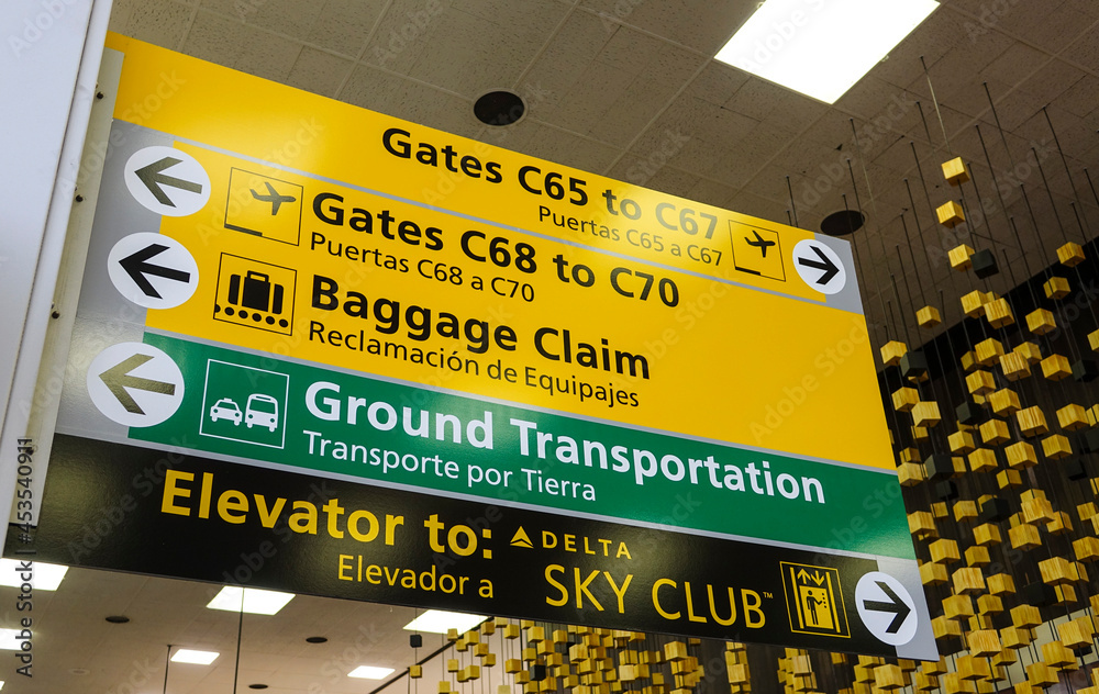 Direction signs at gate of JFK Airport New York Stock Photo | Adobe Stock