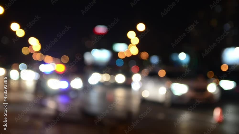 Blurred blue and red lights on patrol car. Police lights flash at night ...