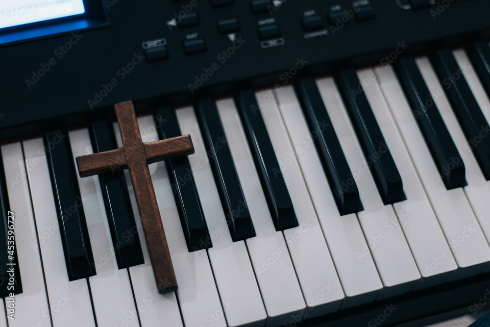 Wooden cross on piano keys, top view Stock Photo | Adobe Stock
