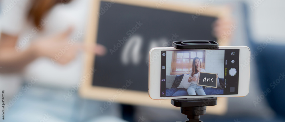 Young asian woman is teacher teaching language english with student for ...