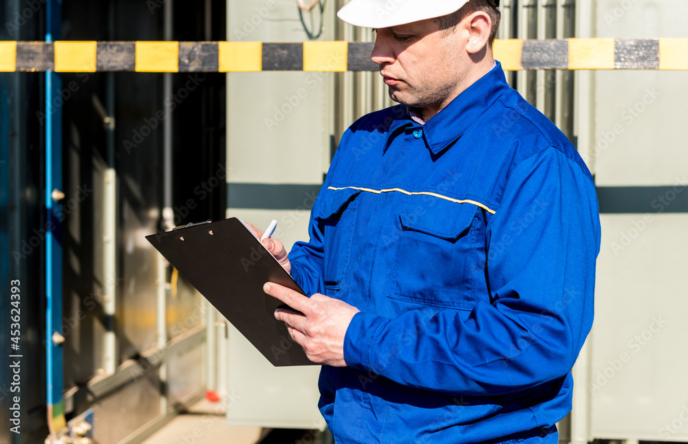 Execution of electrical measuring works on the power transformer Stock ...