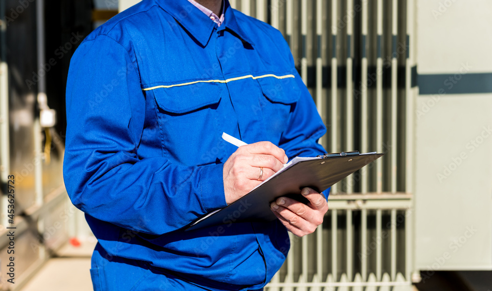 Execution of electrical measuring works on the power transformer Stock ...