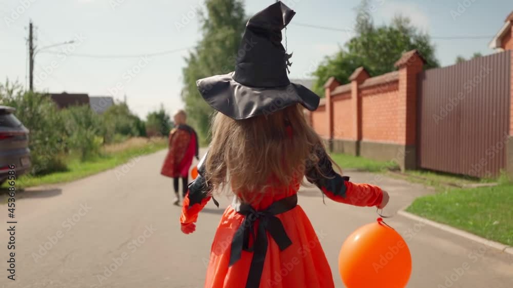 Halloween kids going to collect candy. Trick-or-treating. Guising. Jack ...