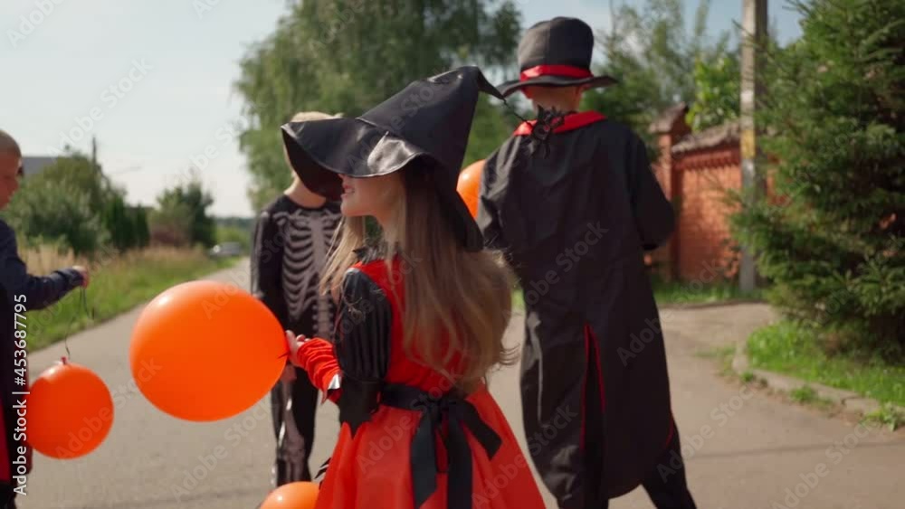 Halloween kids going to collect candy. Trick-or-treating. Guising. Jack ...