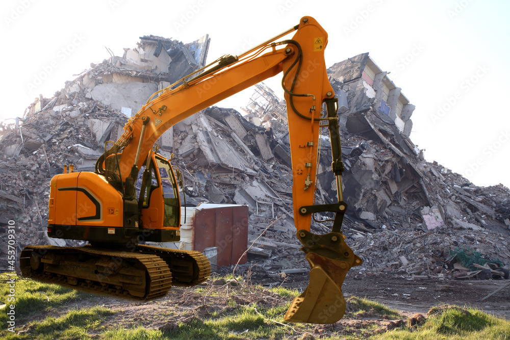 Excavators are heavy construction equipment consisting of a boom ...