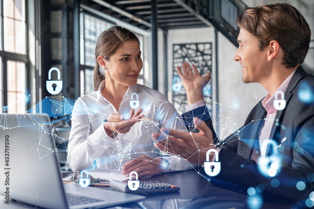 Businessman and businesswoman working together to protect clients ...