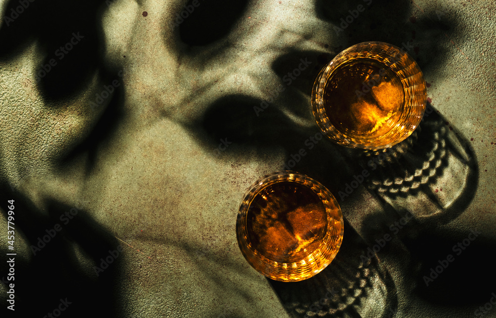 American bourbon whiskey in glasses, rusty green background with shadow ...