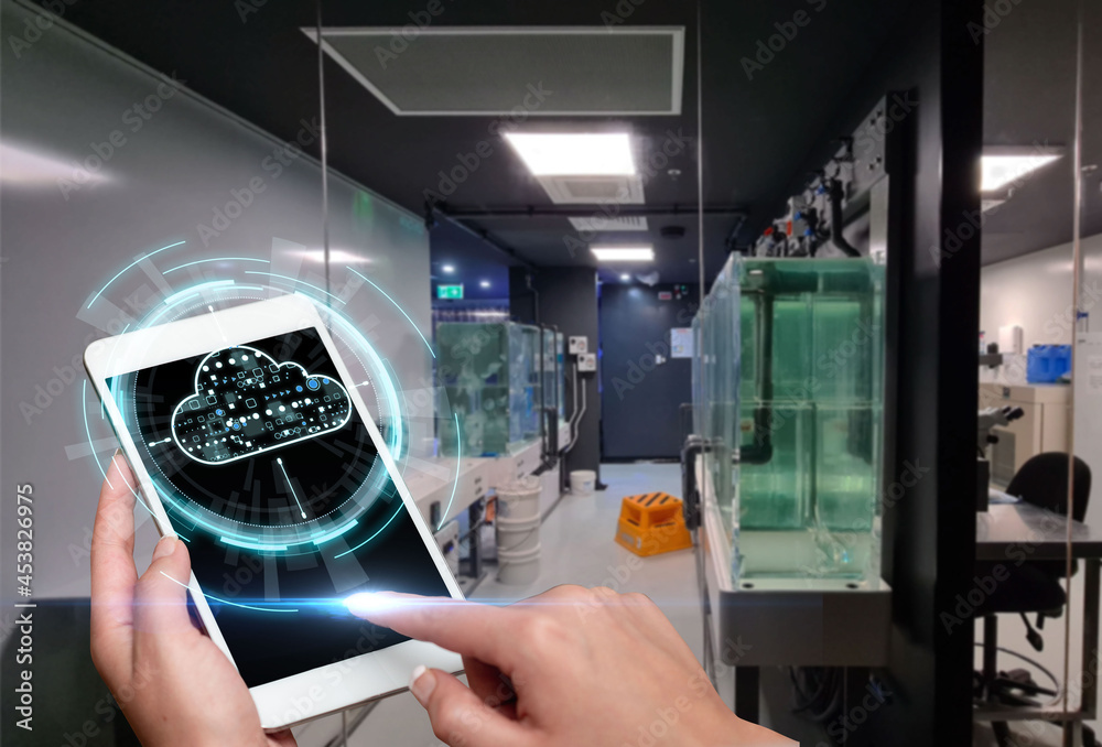 Hand Touching Screen Of Mobile Phone In Laboratory Showing Futuristic ...