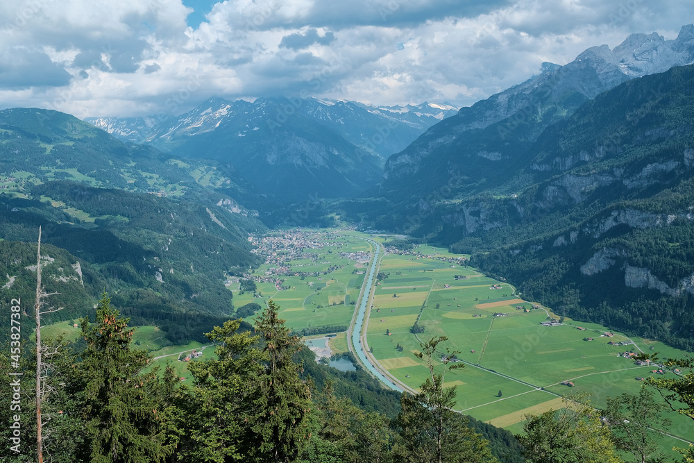 Bird's eye view of a green meadow in Bern, Switzerland with the ... Bird's eye view of a green meadow in Bern, Switzerland with the ...