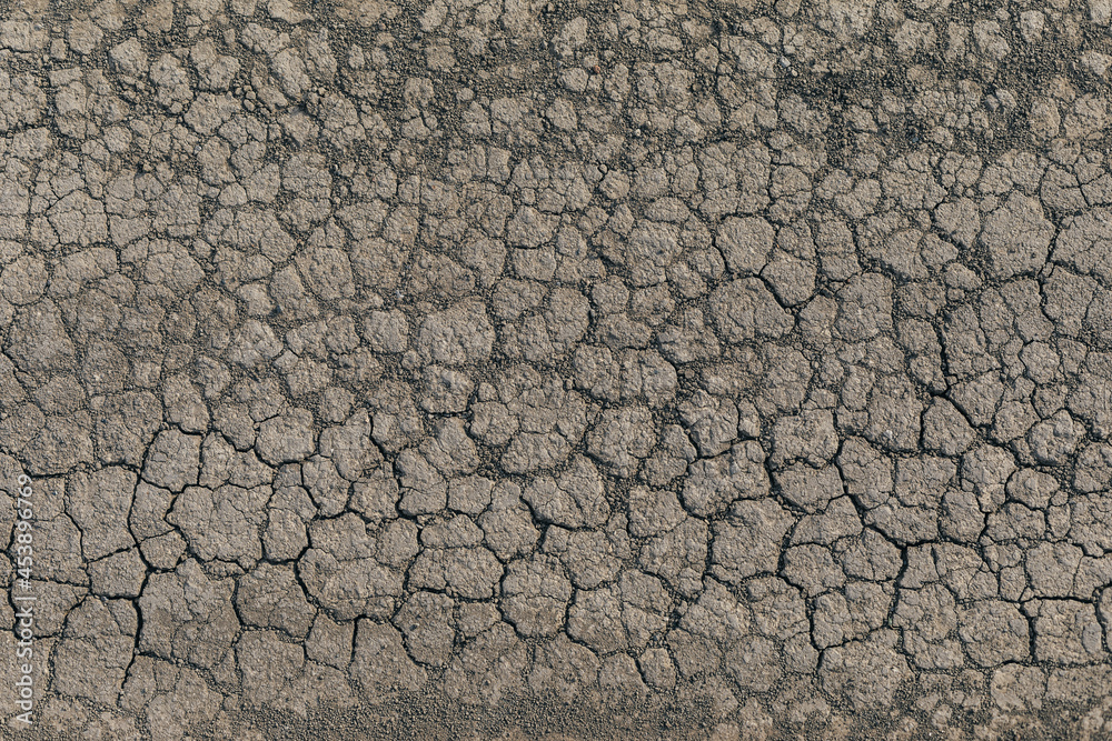 Full frame of the textures, drawings and colors of the dry land with ...