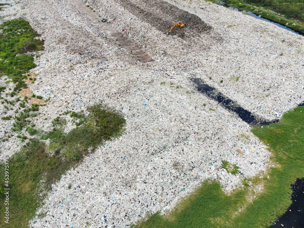 Aerial view landfill garbage waste huge dump environmental pollution ...