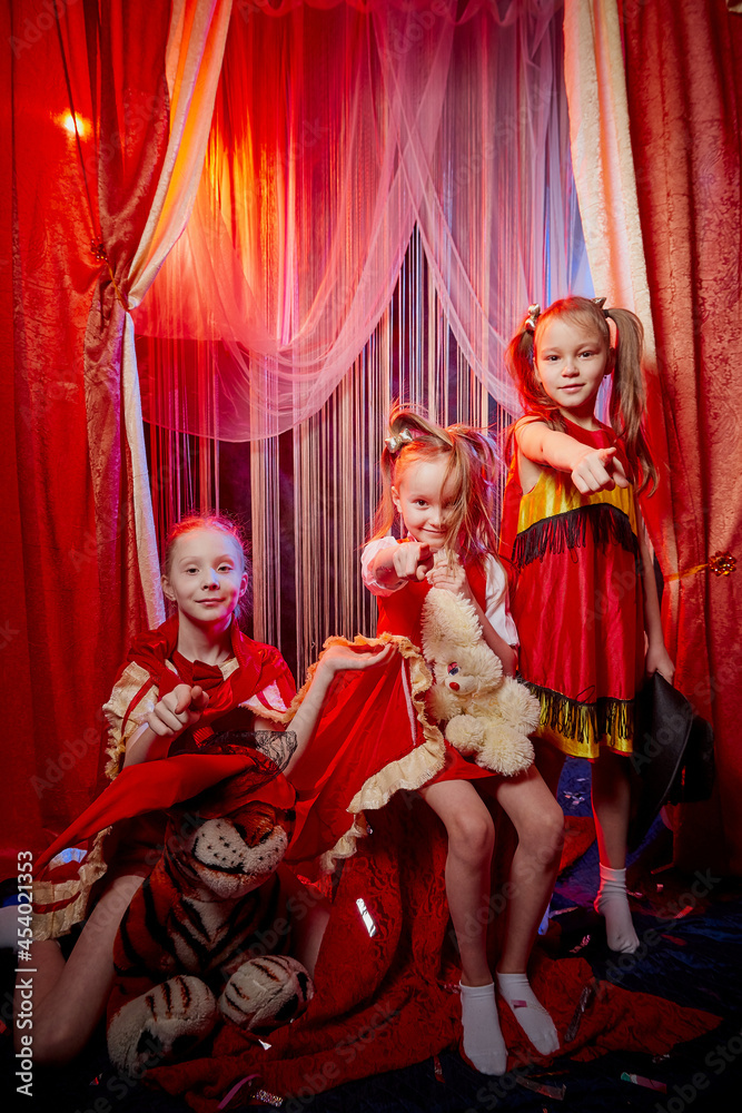Small girls during a stylized theatrical circus photo shoot in a ...
