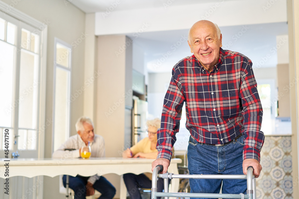 Smiling senior man using walker after stroke Stock Photo | Adobe Stock