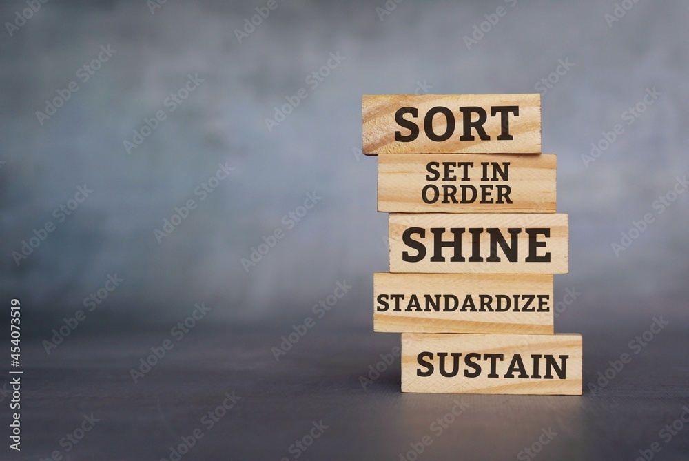 The 5s workplace organization method. Stack of wooden tiles with text ...