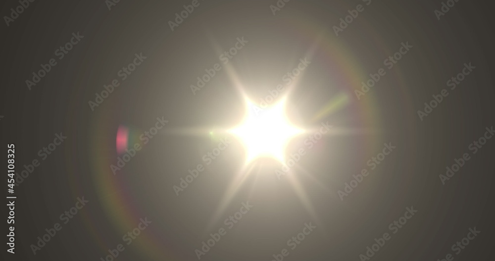 Spot of light and lens flare against black background Stock-Foto ...