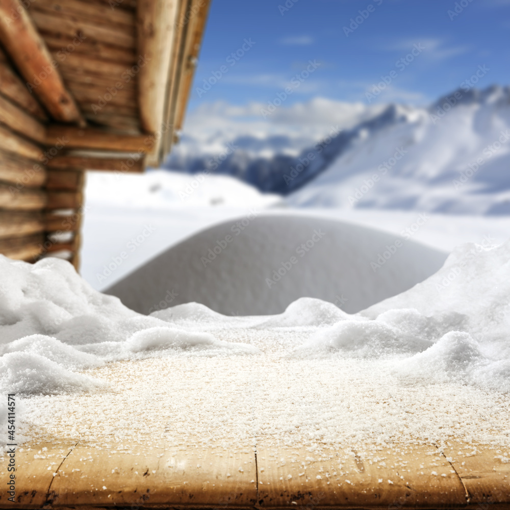 Wooden desk of free space and winter background of mountains. Board ...